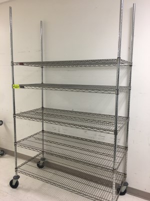 1) Metal Rack on Wheels for sale