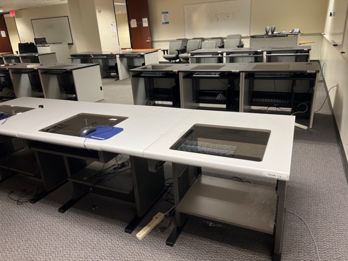 Estimated (36) training desk with power and 2 pedestal stands for sale