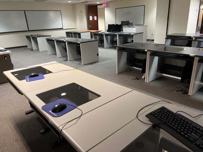 Estimated (36) training desk with power and 2 pedestal stands for sale