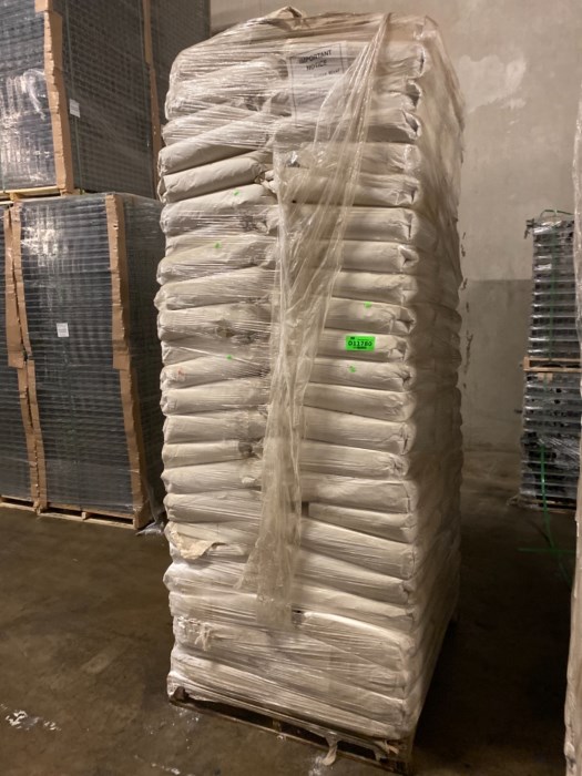 Huge pallet of estimated (130) bags of 10lb Stardust Heavy Absorption ...