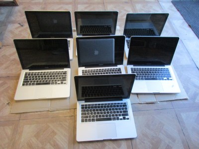 Lot of 7 various models Mac Book Pro laptops. for sale