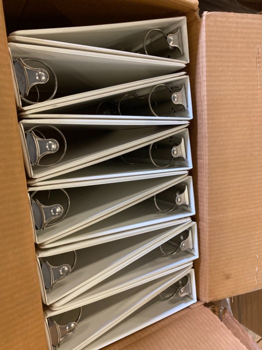Pallet filled with brand new binders for sale