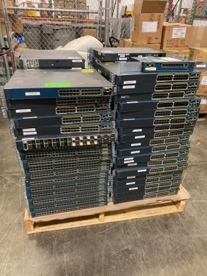 Pallet filled with Cisco catalyst switches for sale
