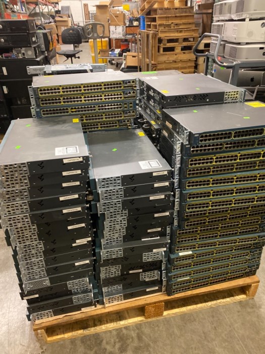 Pallet filled with Cisco catalyst switches for sale