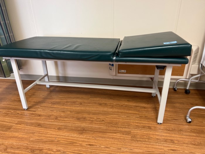 Winco 857 2 section medical table with metal frame for sale
